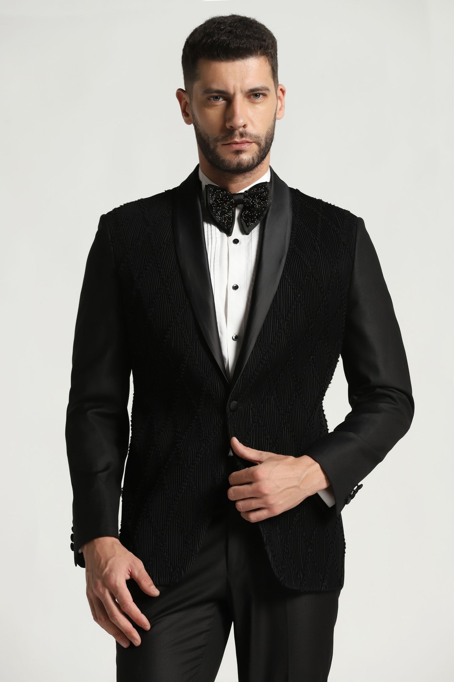 Elegance in Ebony Attire - Black Tuxedo Suit with Pintucks and Frills ...