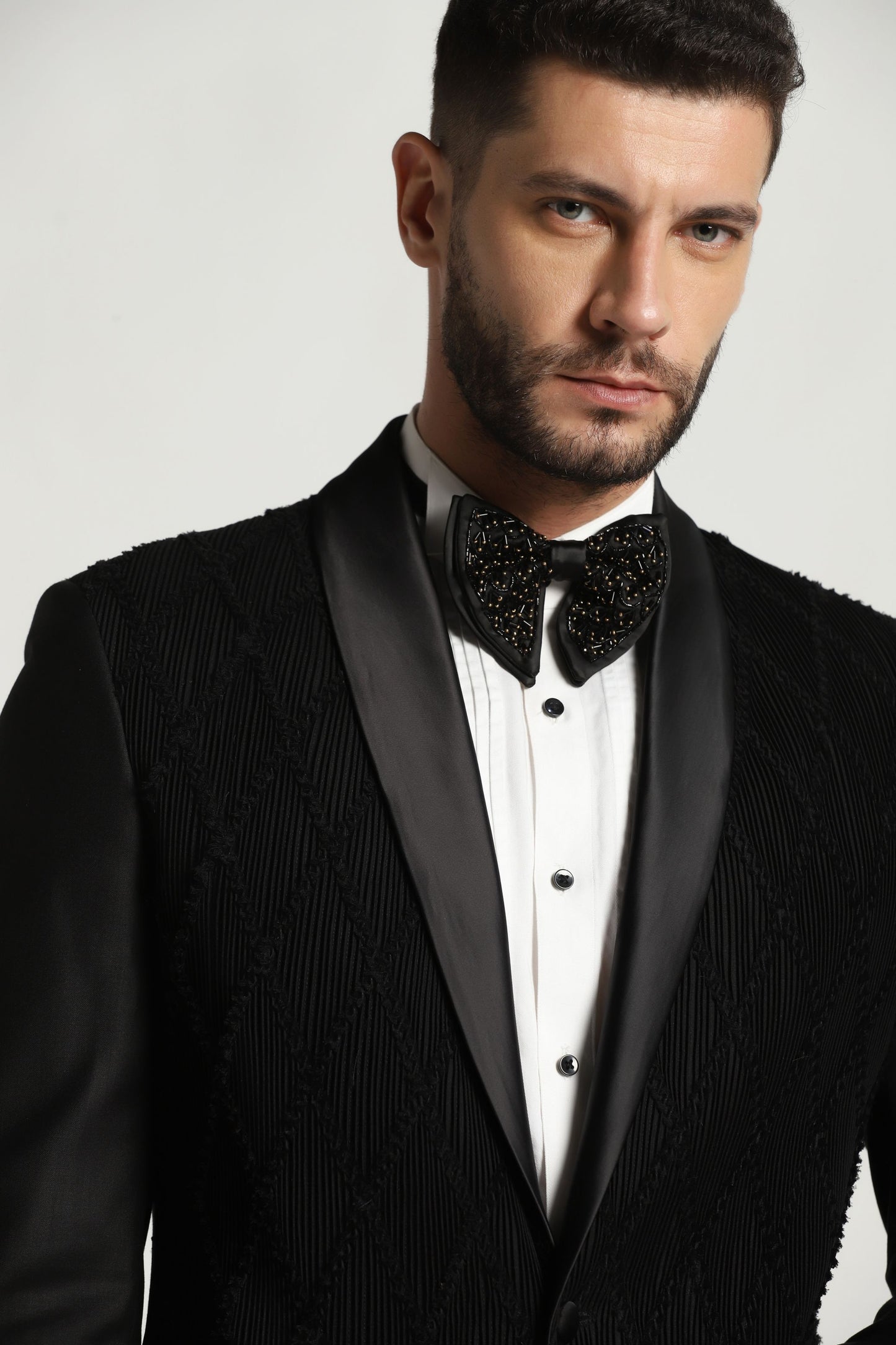 Elegance in Ebony Attire - Black Tuxedo Suit with Pintucks and Frills ...