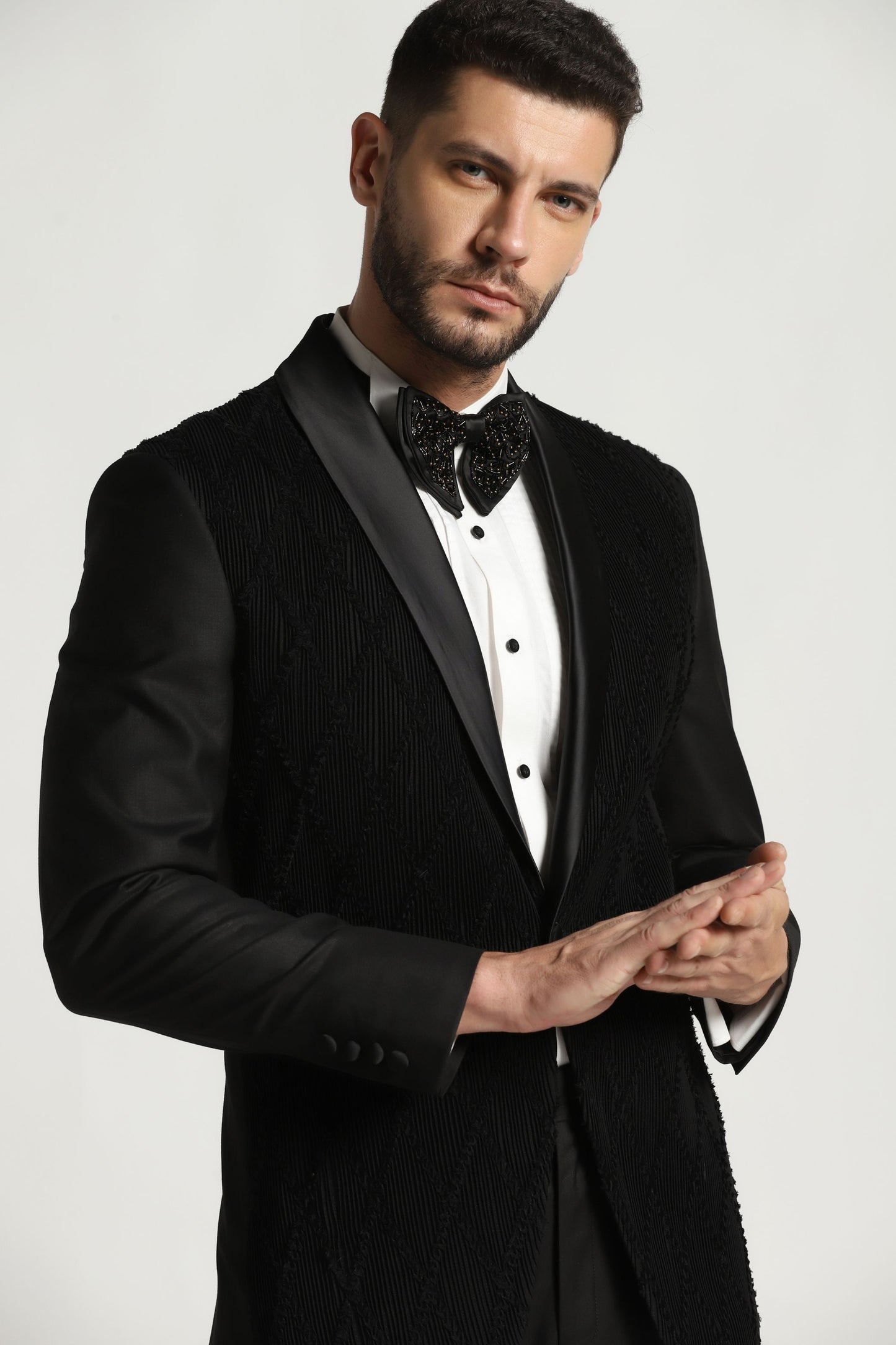 Elegance in Ebony Attire - Black Tuxedo Suit with Pintucks and Frills ...
